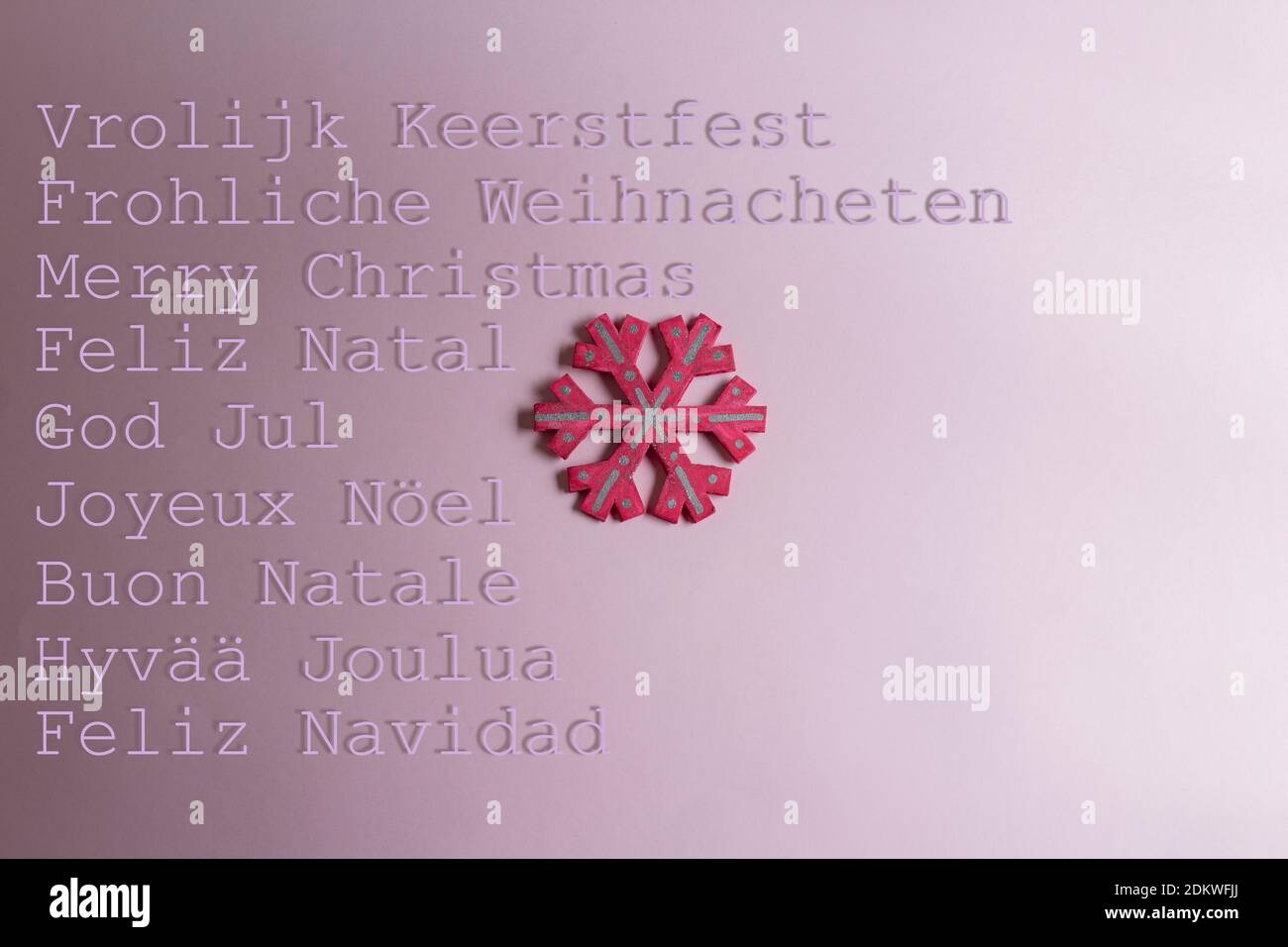 Christmas card in pink with pink snowflake decoration and Merry ...