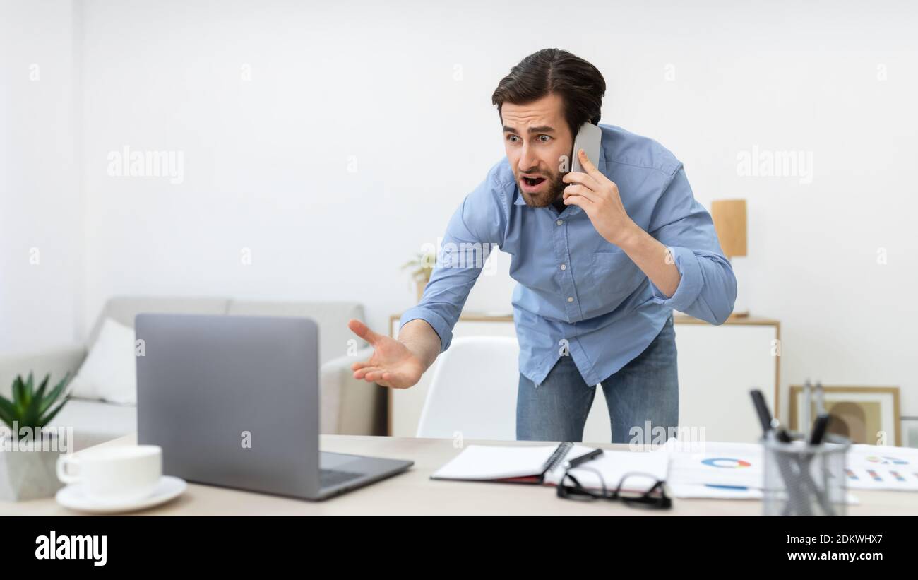 Angry guy shouting mobile phone hi-res stock photography and images - Alamy