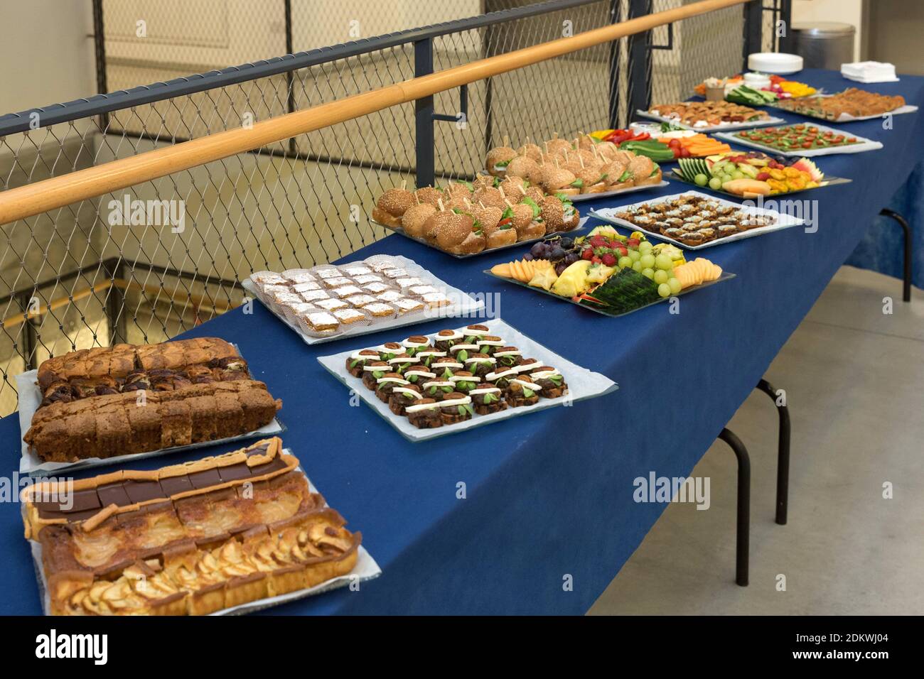 An assortment of foods in bowls on a buffet table during a posh ...