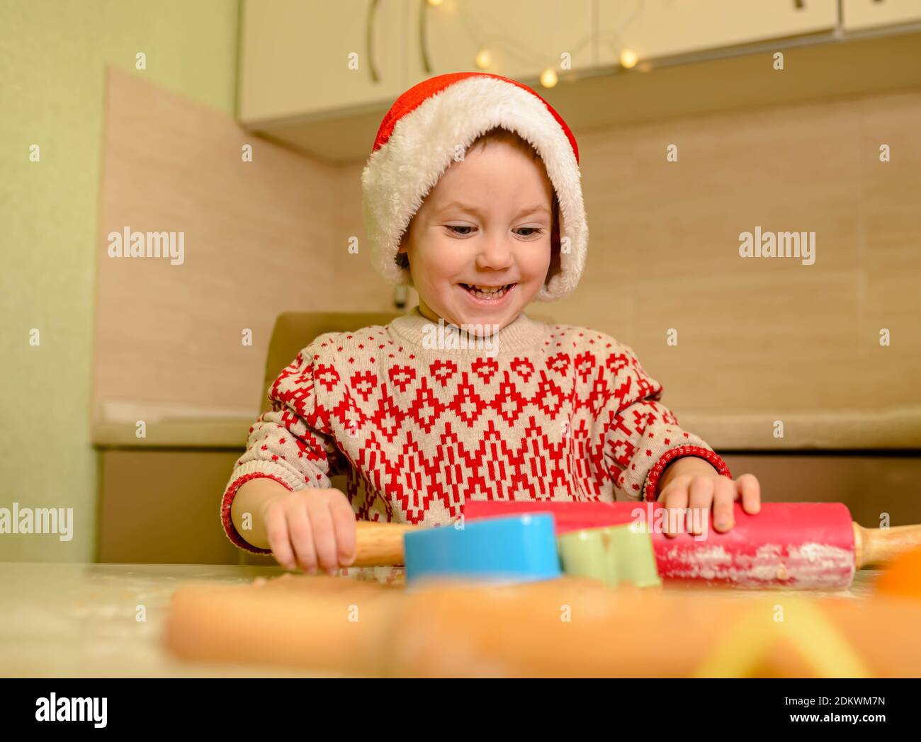 Funny boy with rolling pin in domestic kitchen. Child having fun Stock ...
