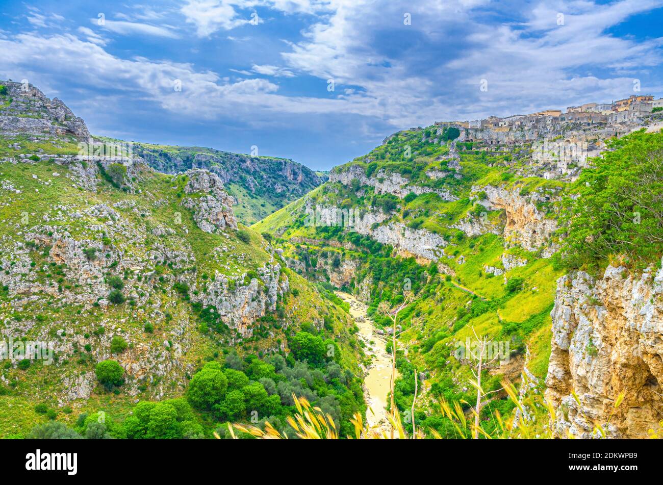 Aerial view of ravine canyon with rocks and caves di Murgia Timone near ...