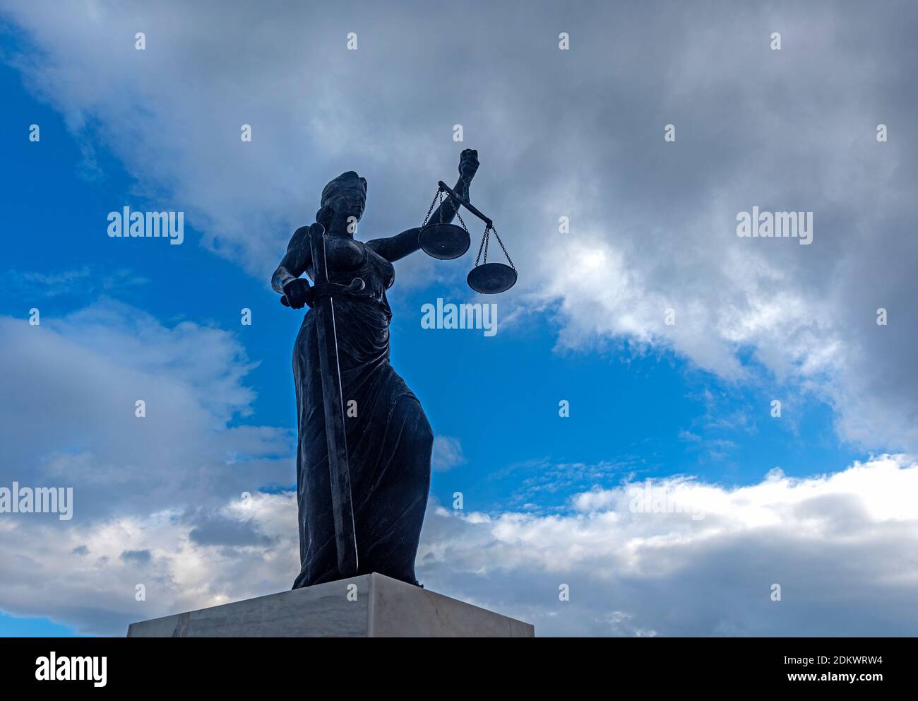 Statue of Justice The combination of Justitia, the Roman goddess of ...