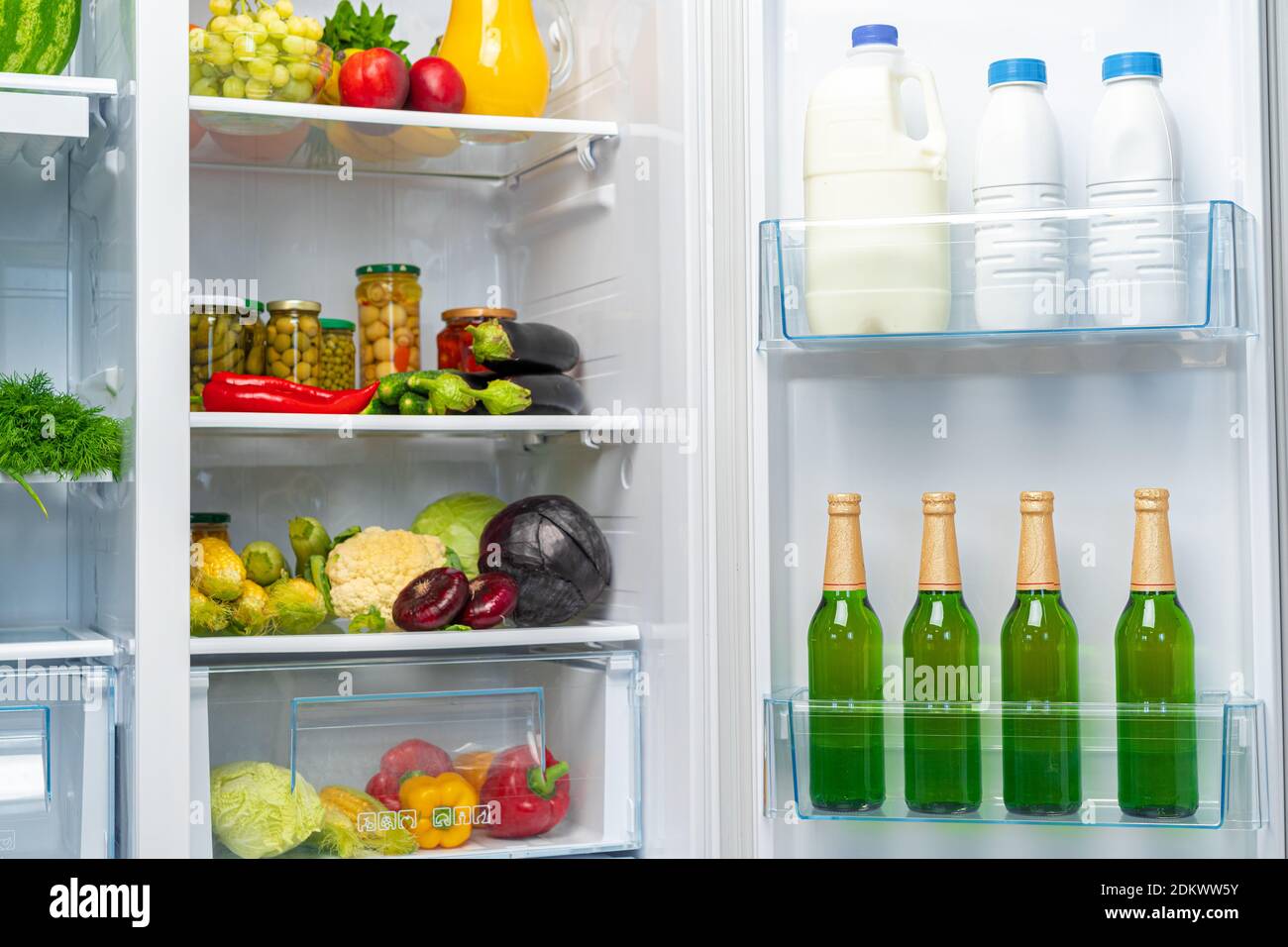Open refrigerator full products hi-res stock photography and images - Alamy