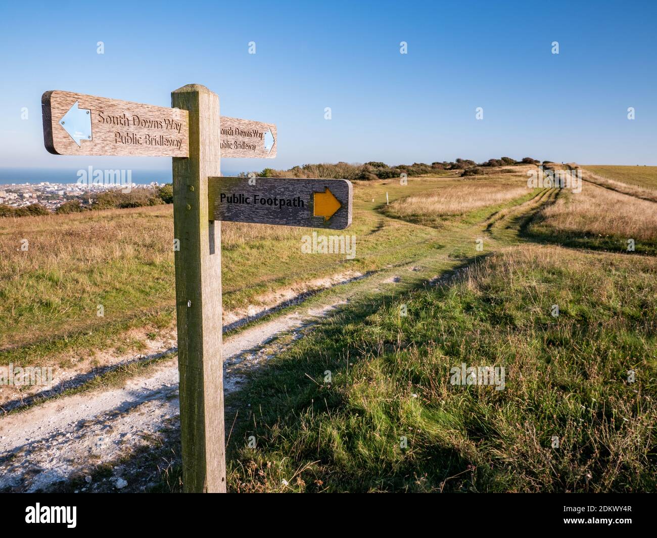 South Downs Way footpath sign. A wooden signpost giving directions to ...
