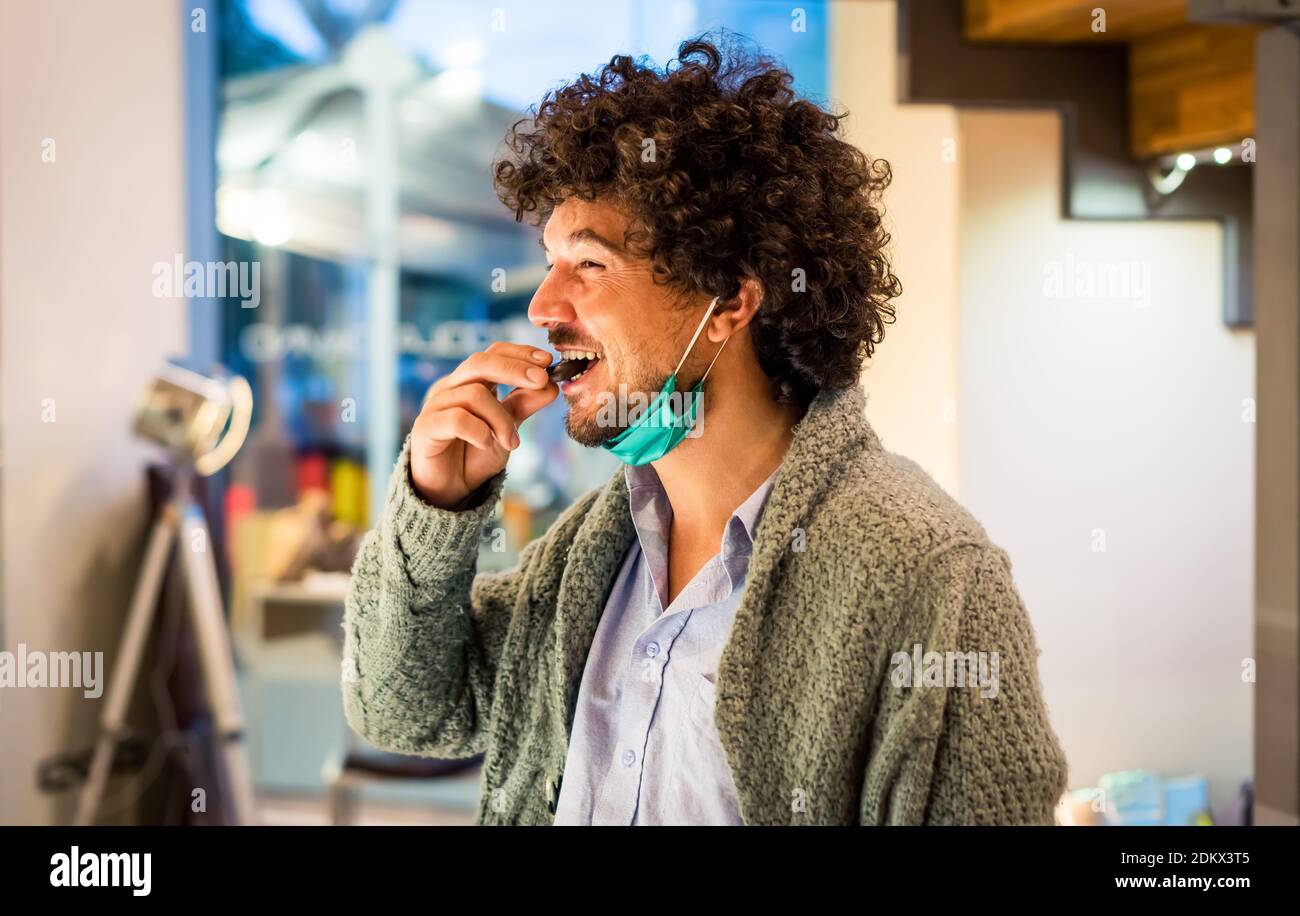 Adult eating chocolate christmas inside hi-res stock photography and ...