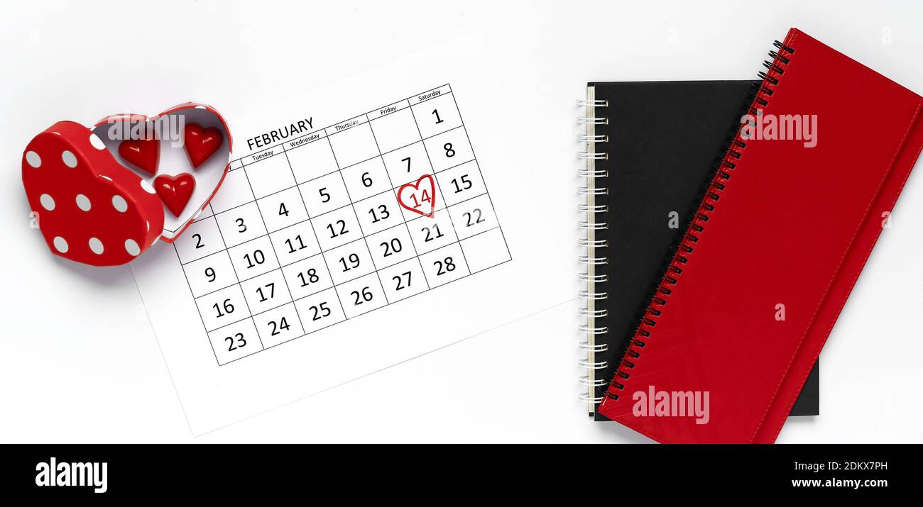 February of 14th calendar template with candy heart shape and notebooks ...