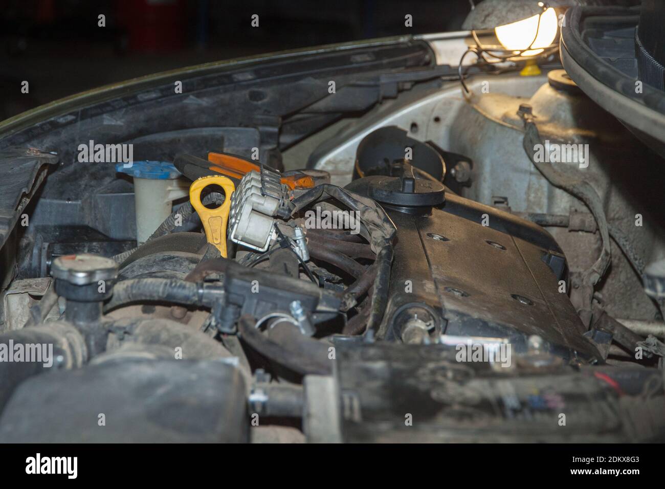 Diagnostics and repair of the car engine in the repair service Stock ...