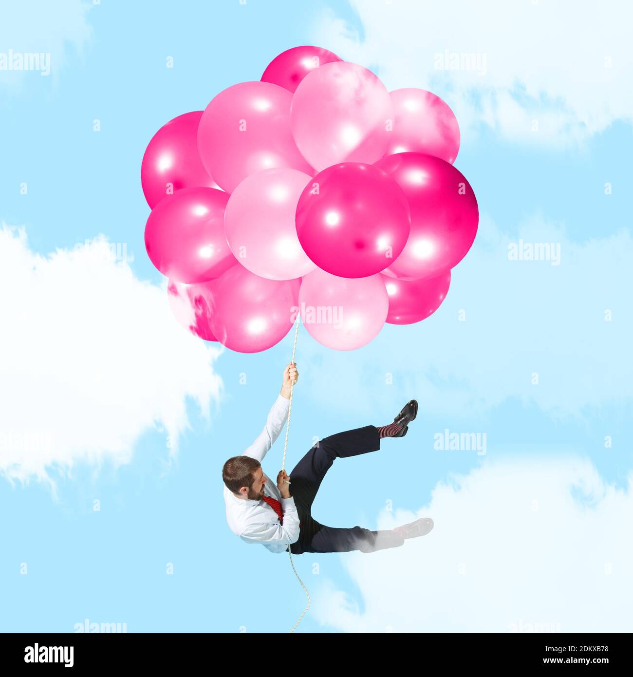 Manager falling down from the sky fighting with pink bubbles. Copyspace ...