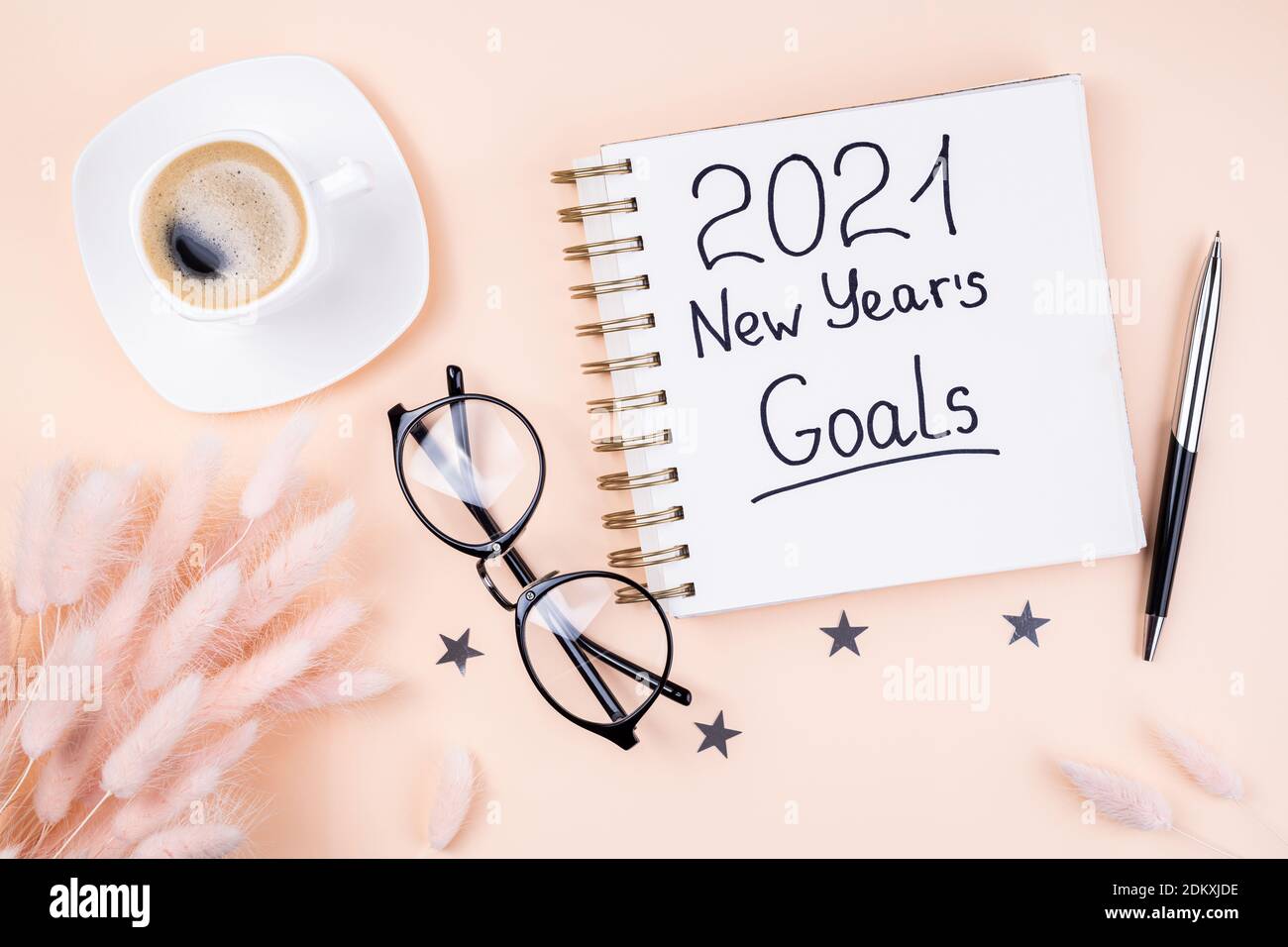 New year 2021 goals on desk. 2021 goals with open notebook, coffee cup ...