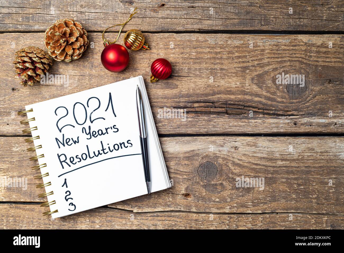 New year resolutions 2021 on desk. 2021 resolutions with open notebook ...