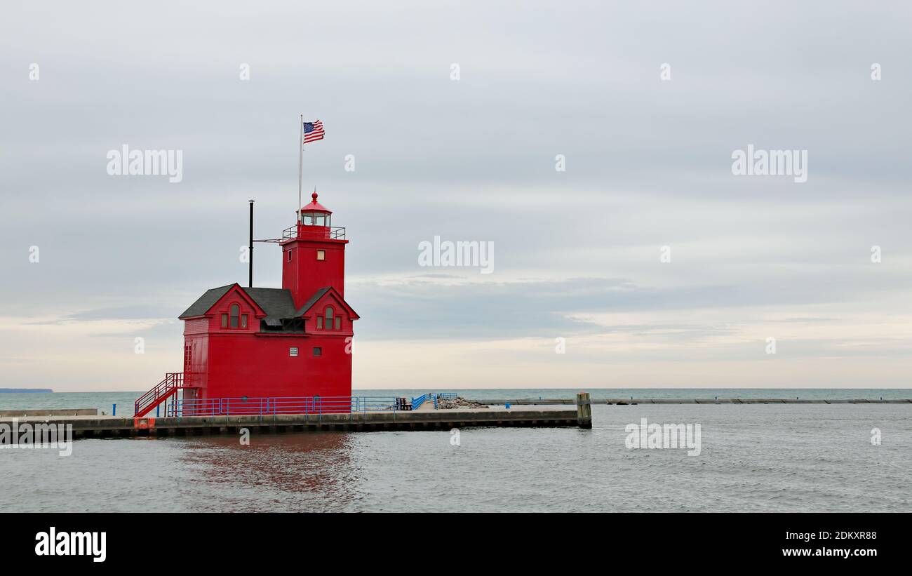 Holland Harbor Light, known as Big Red on an overcast day Stock Photo ...