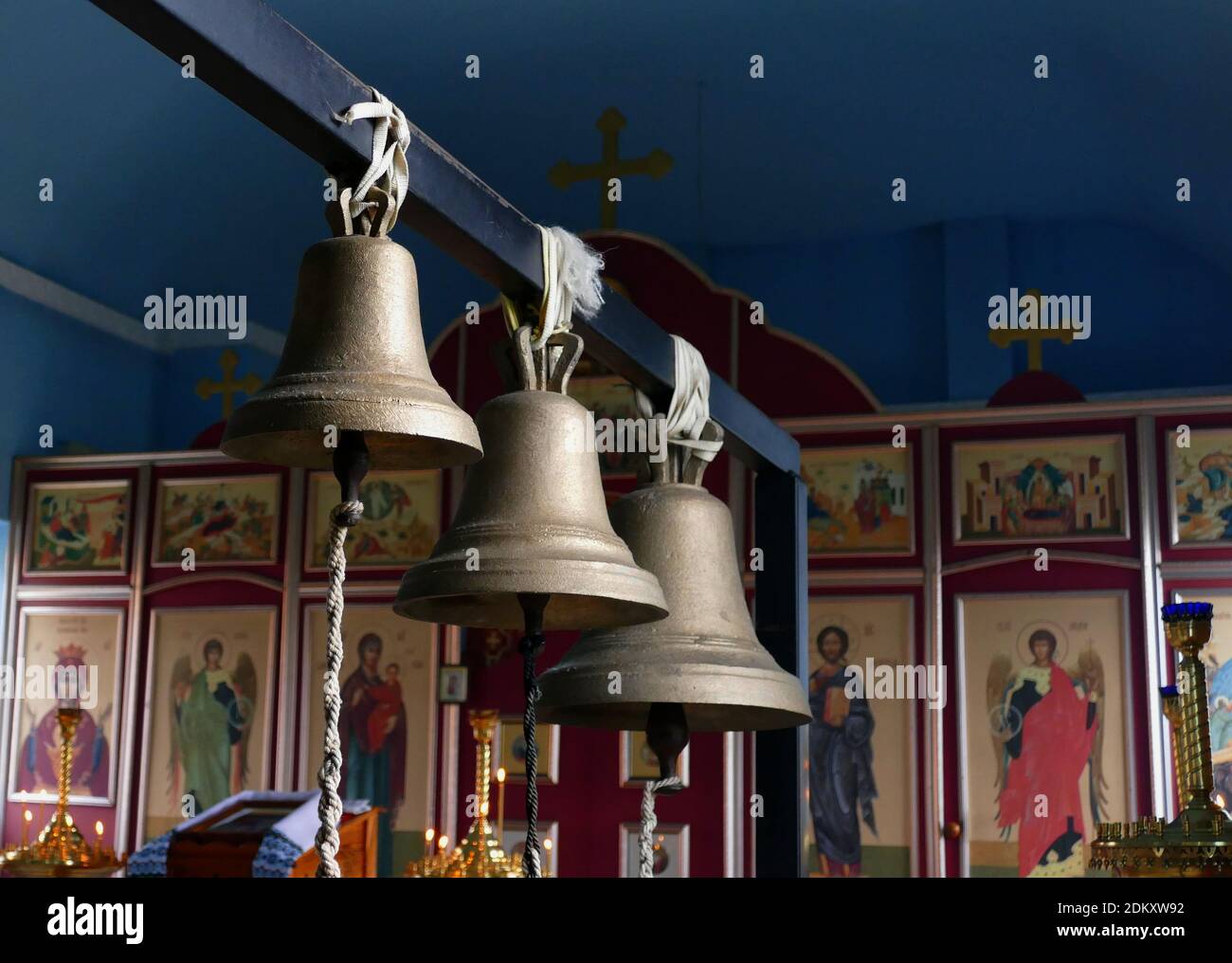 Small Church Bells And Icons In Christian Chapel Stock Photo - Alamy