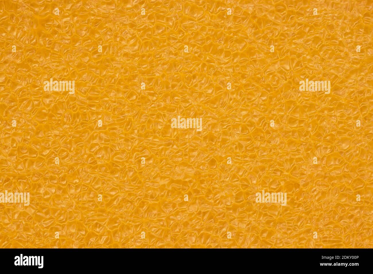 Texture of styrofoam . Structure polystyrene plastic, yellow color ...