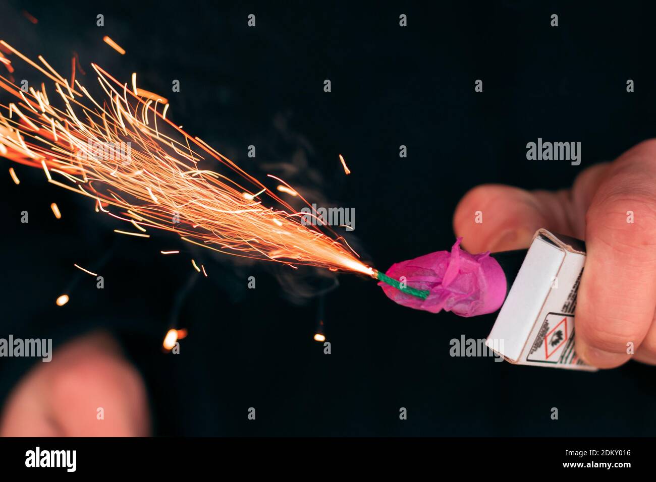 Human hand holding bomb burning hi-res stock photography and images - Alamy