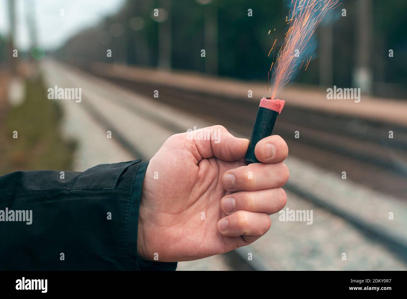 The Firecracker in a Hand. Man Holding a Burning Petard in His Hand. A ...
