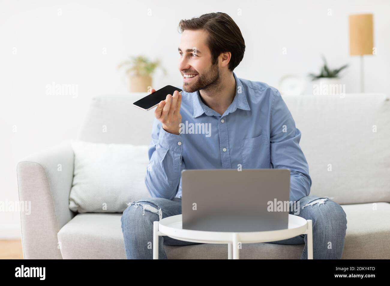 Guy Talking Holding Smartphone Near Mouth Voice Assistant Indoor Stock ...