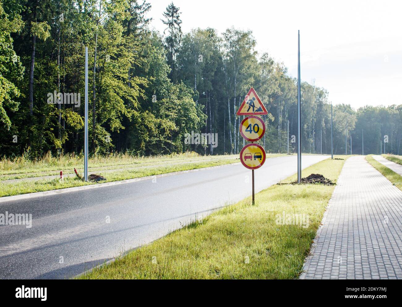 road signs on the new road on sunny summer day Stock Photo - Alamy