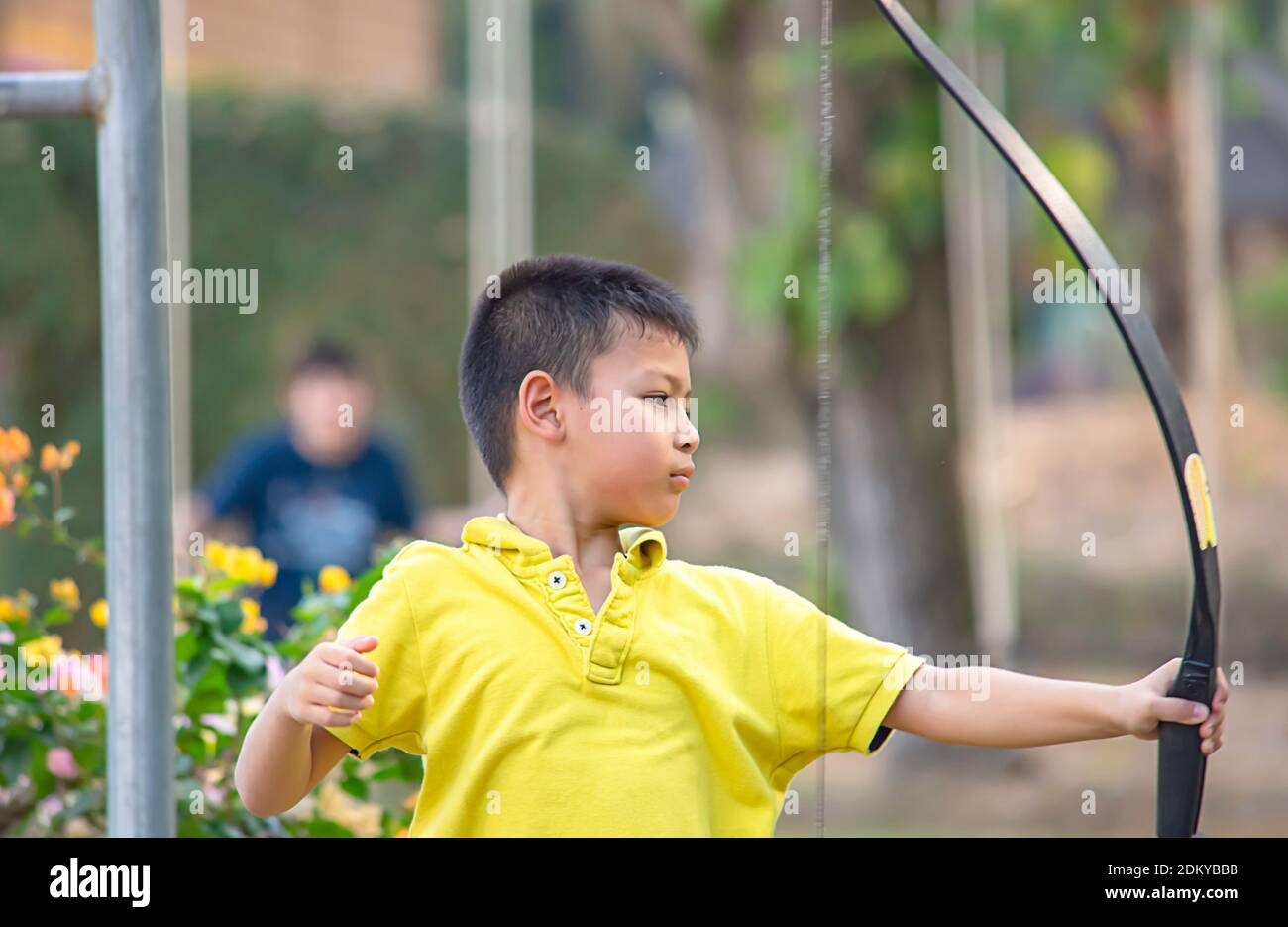 Boy practicing archery hi-res stock photography and images - Alamy