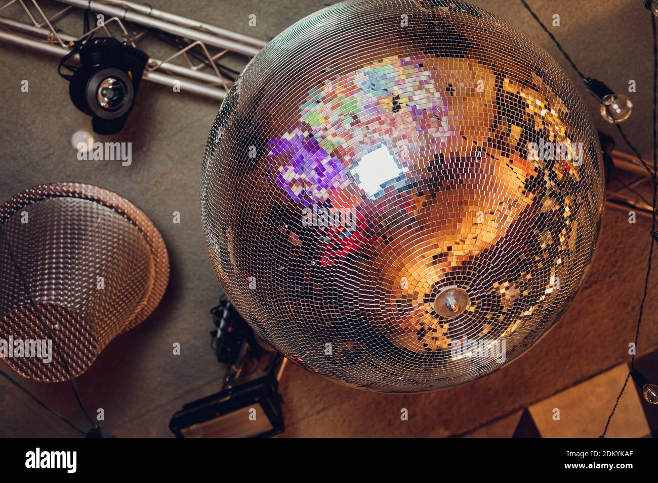 Shiny disco ball in empty hi-res stock photography and images - Alamy