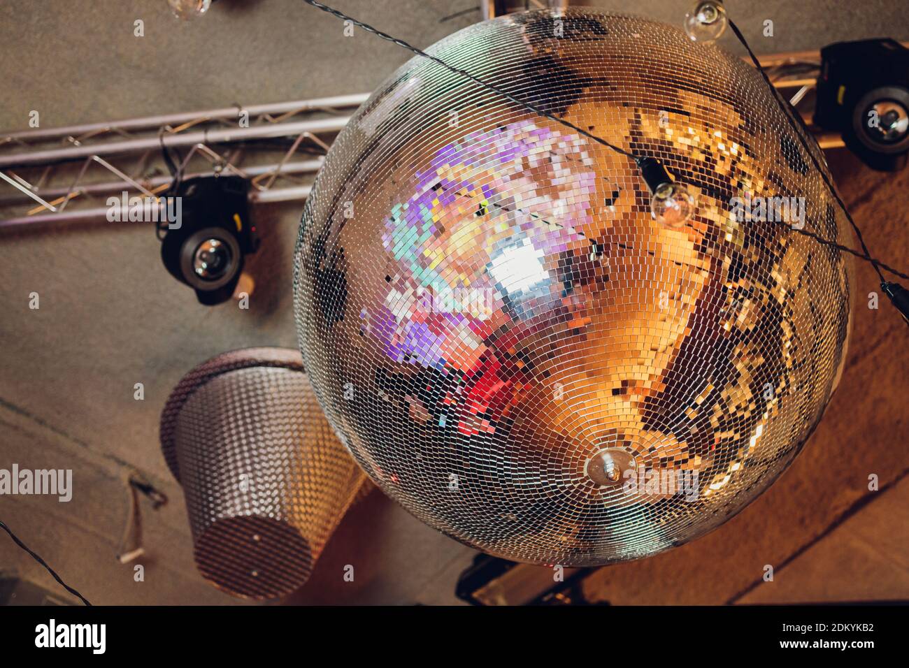 Shiny disco ball in empty hi-res stock photography and images - Alamy