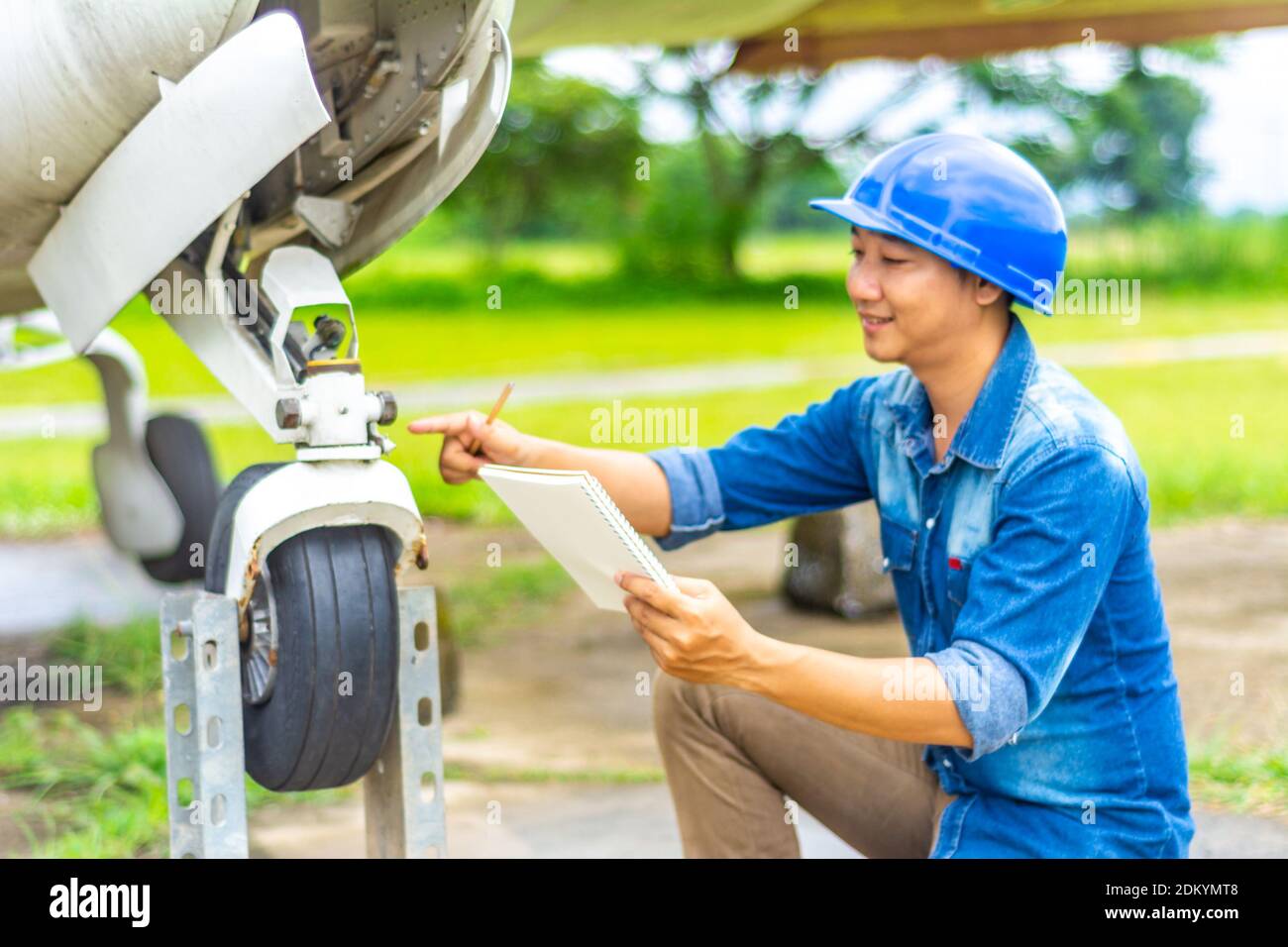 Inspecting an airplane hi-res stock photography and images - Alamy