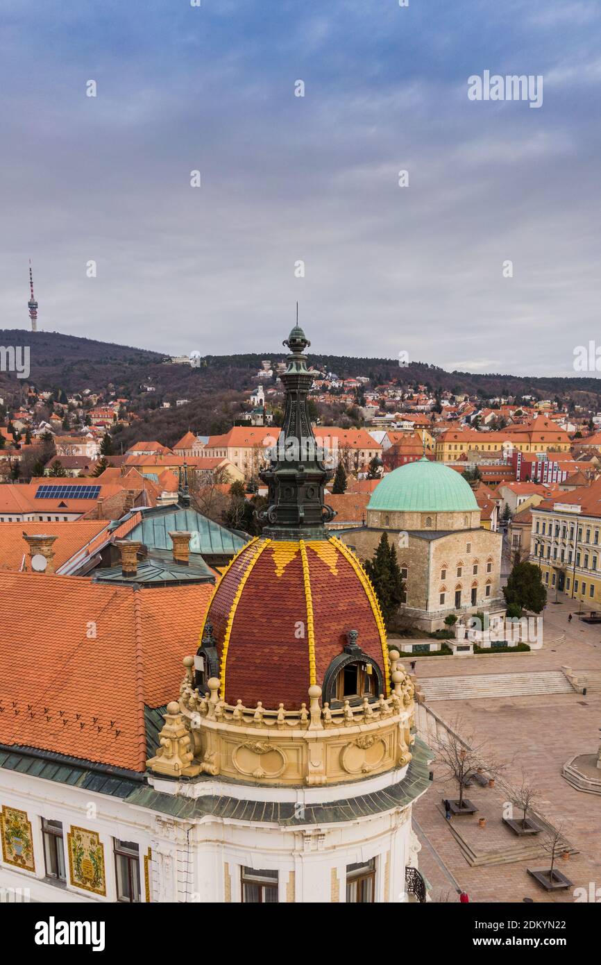 Aerial view of Pecs, Hungary with colorful rooftop of Megyehaza ...