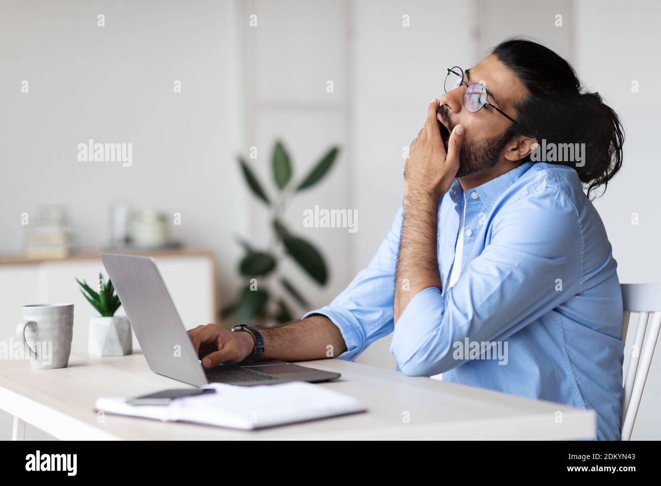 Sleepy Freelancer Guy Yawning At Workplace In Home Office, Tired Of ...