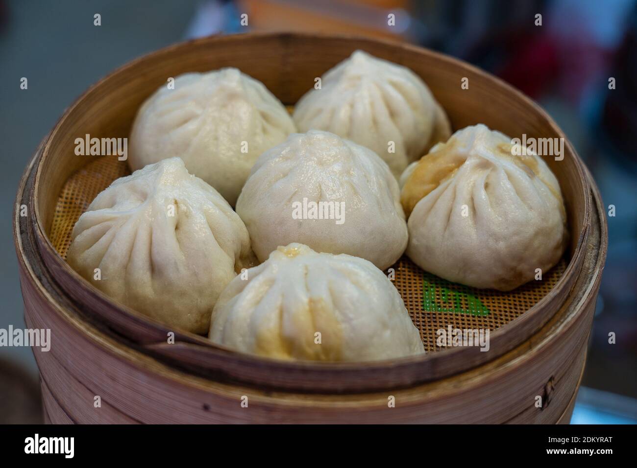 Traditional Chinese steamed bun in tray, Dumping chinese food or dim ...