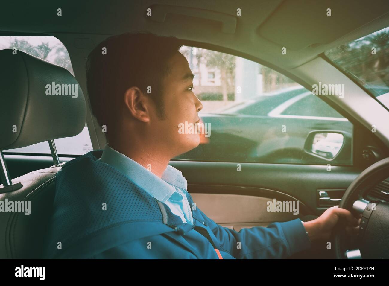 Indian man driving car in hi-res stock photography and images - Alamy