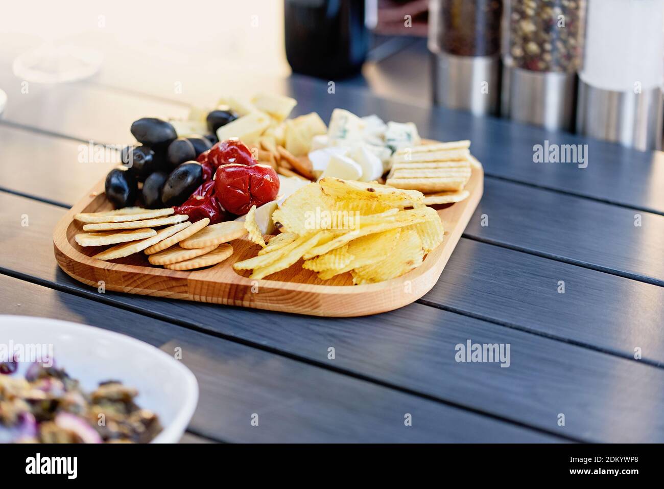 Mix of different snacks and appetizers. Street food plate with set of ...