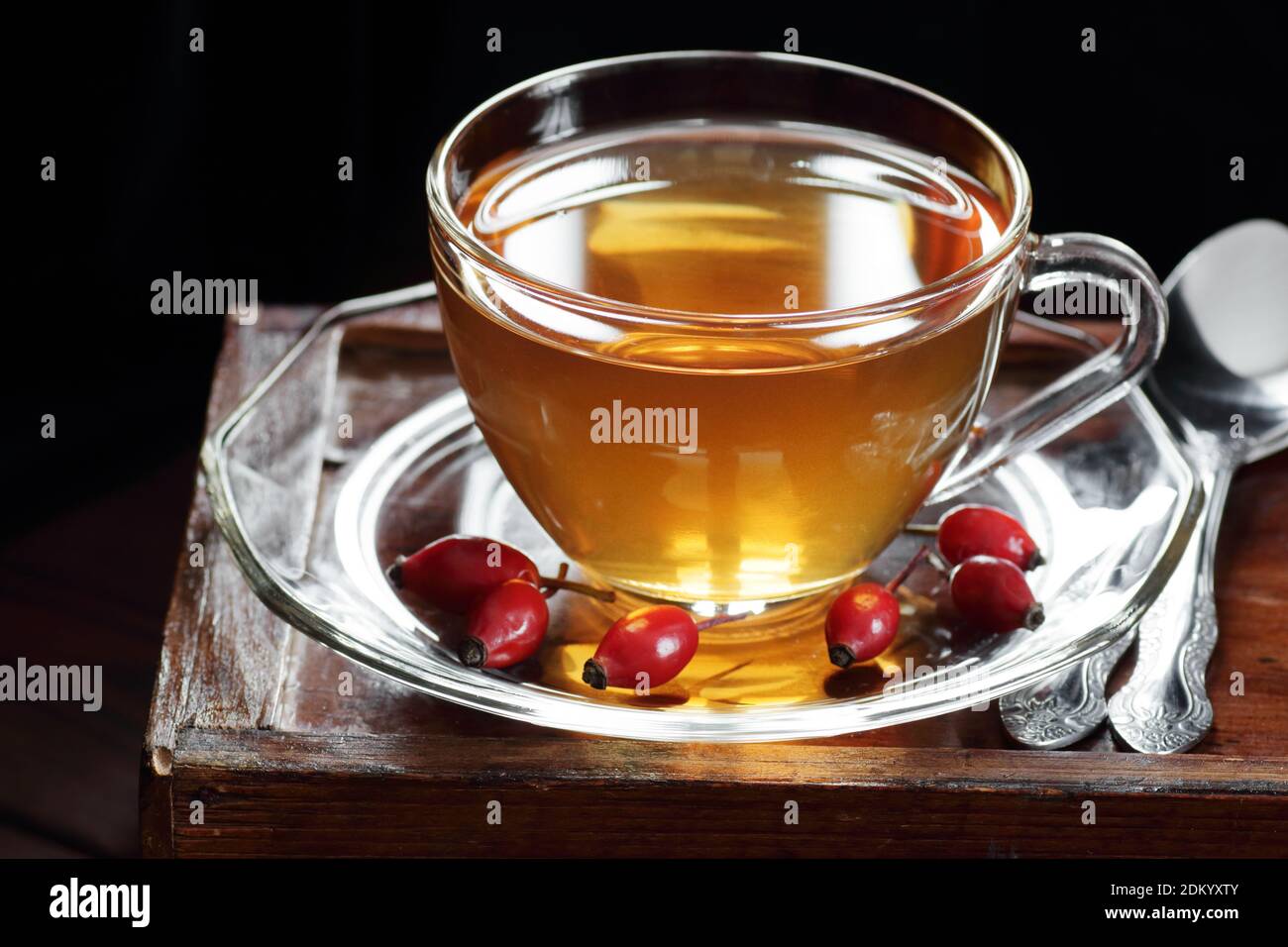Dog rose herbal tea in a glass cup with hips red berry, natural vitamin ...