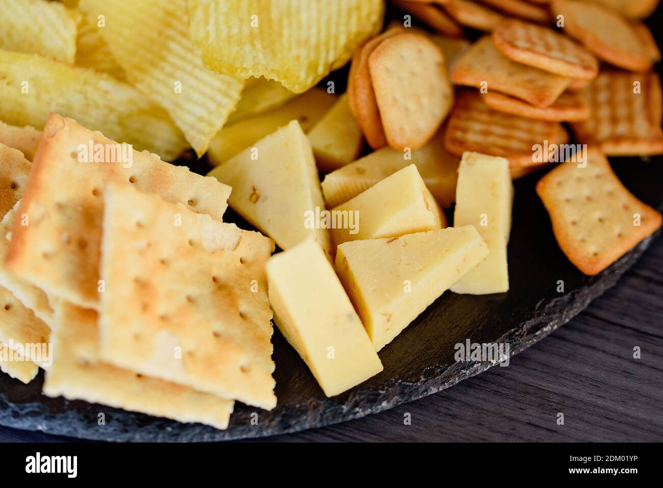 Mix of different snacks and appetizers. Street food plate with set of ...