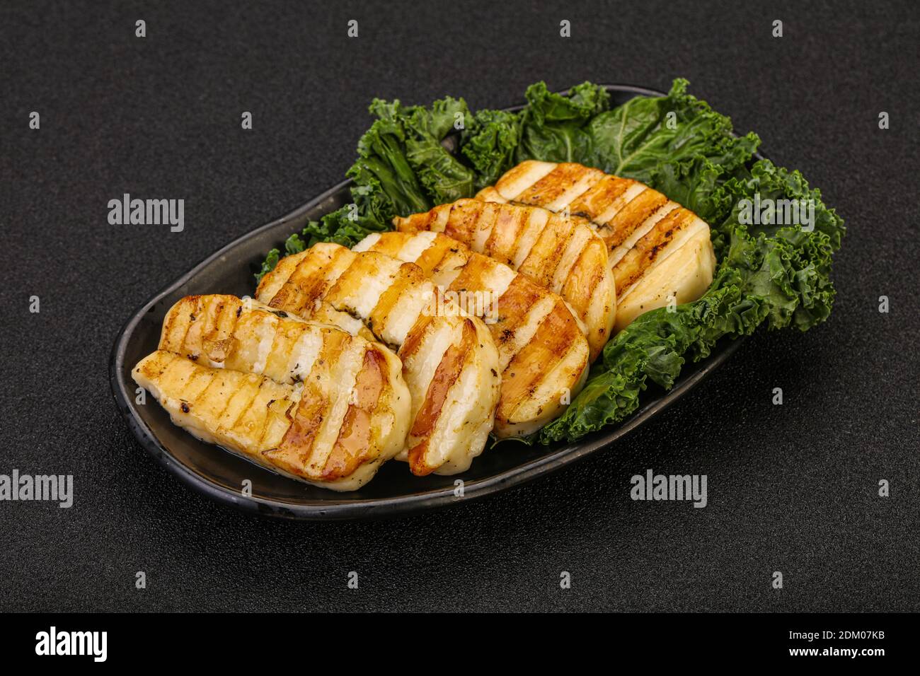 Grilled Greek haloumi cheese with herbs and spices Stock Photo - Alamy