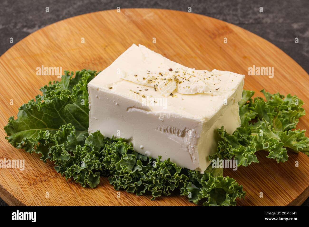 Traditional tasty Greek Feta soft cheese brick Stock Photo - Alamy