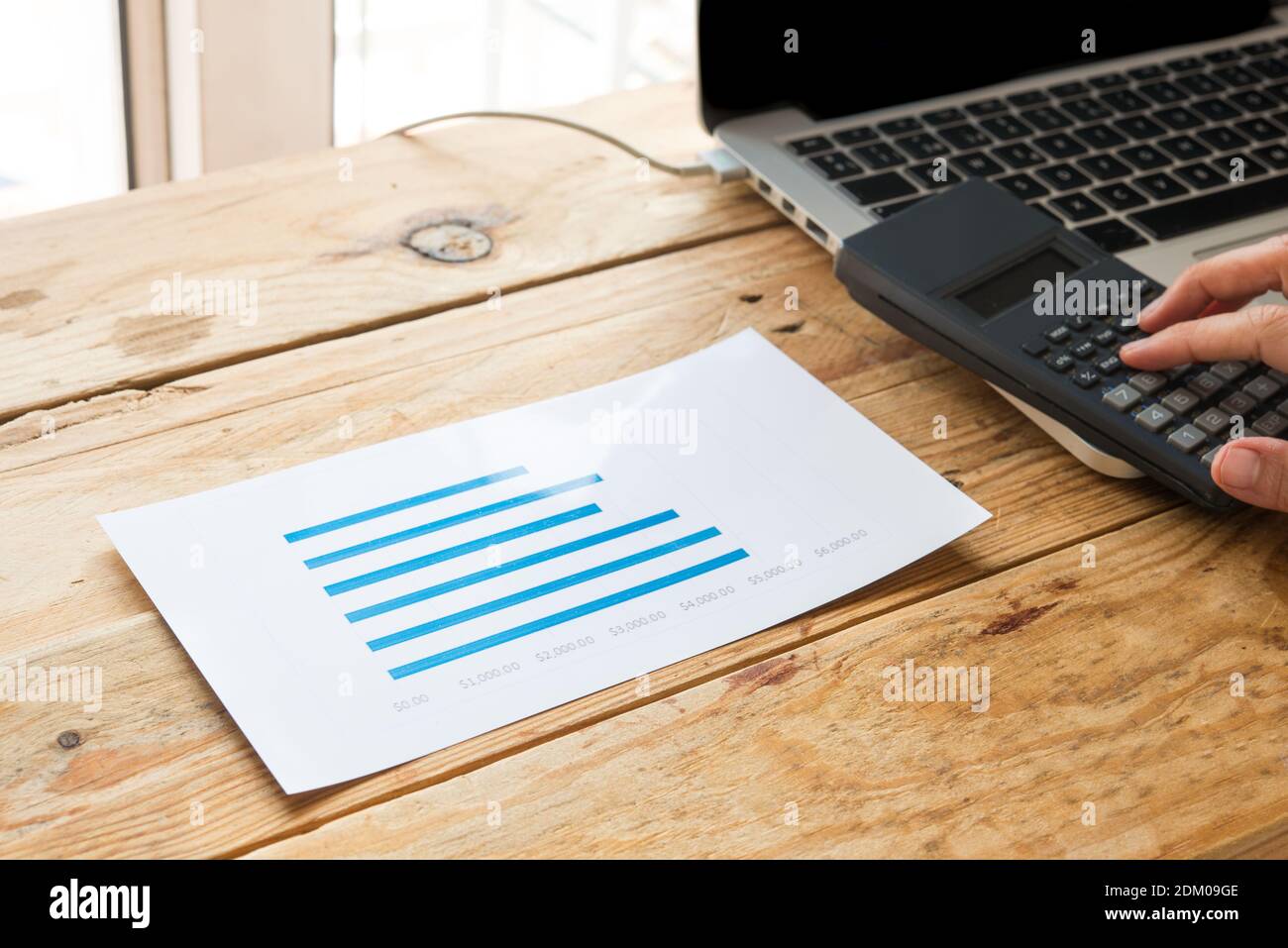 desk table with analysis chart or graph Stock Photo - Alamy