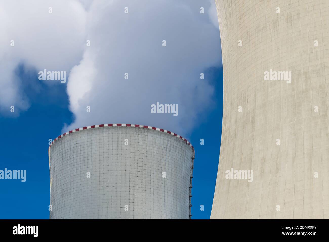 Detail of nuclear power plant cooling towers from concrete and white ...