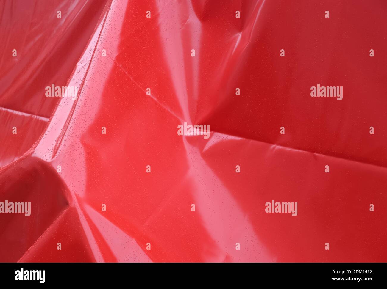 A closeup detailed view on plastic foil and plastic surfaces in high ...