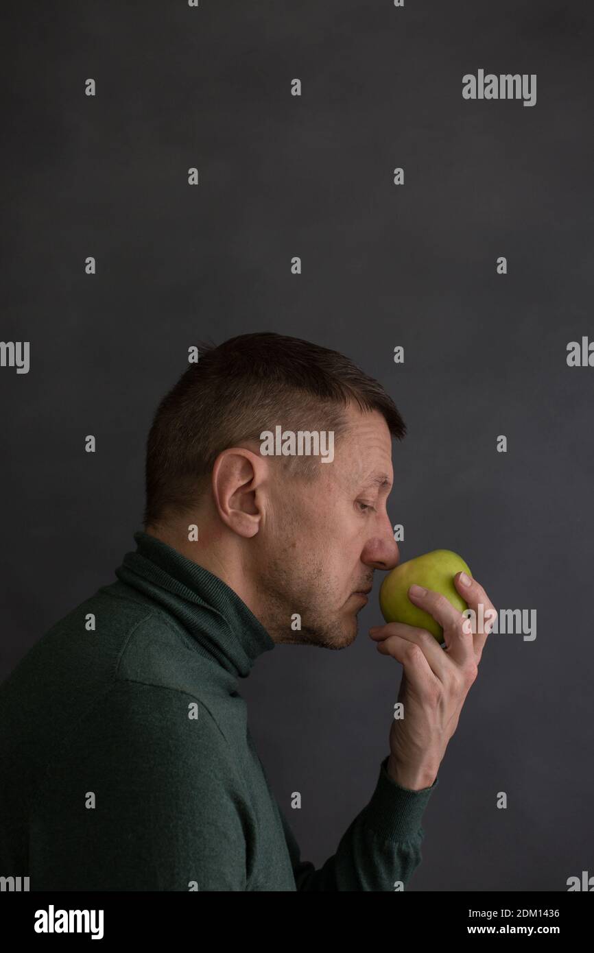 Man sniffing hi-res stock photography and images - Alamy