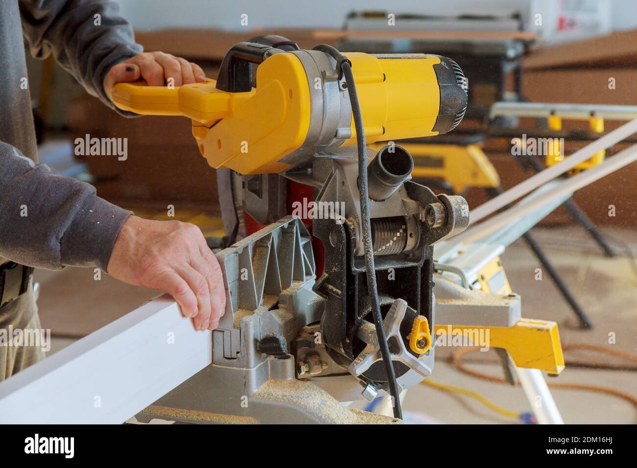 Cutting moulding for renovation new house under construction finishing ...