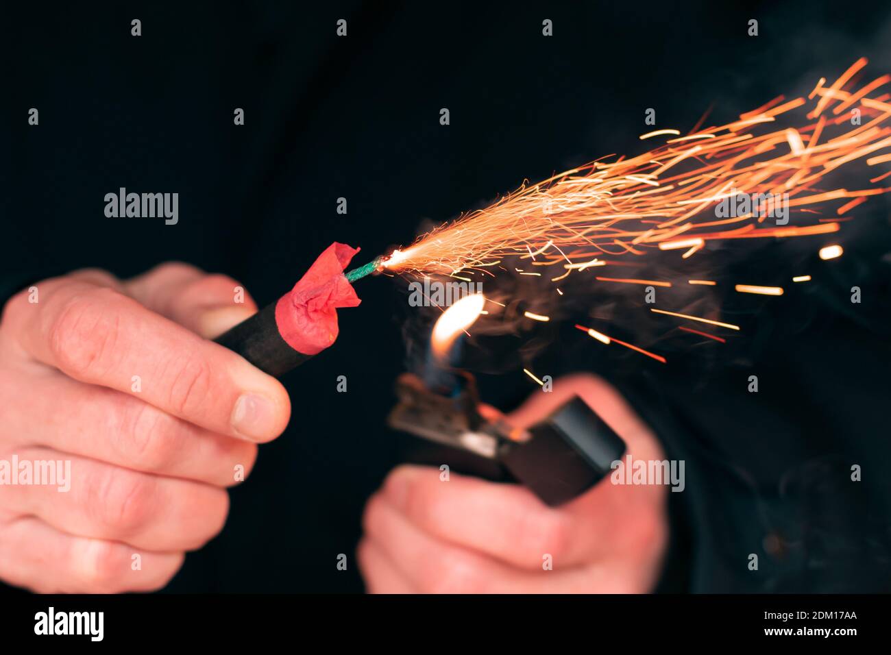 Human hand holding bomb burning hi-res stock photography and images - Alamy