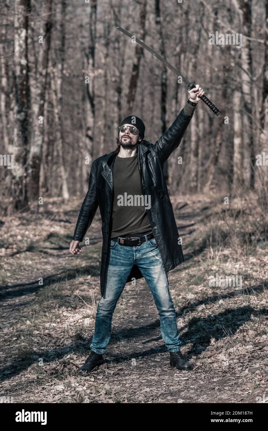 Sword raised hi-res stock photography and images - Alamy