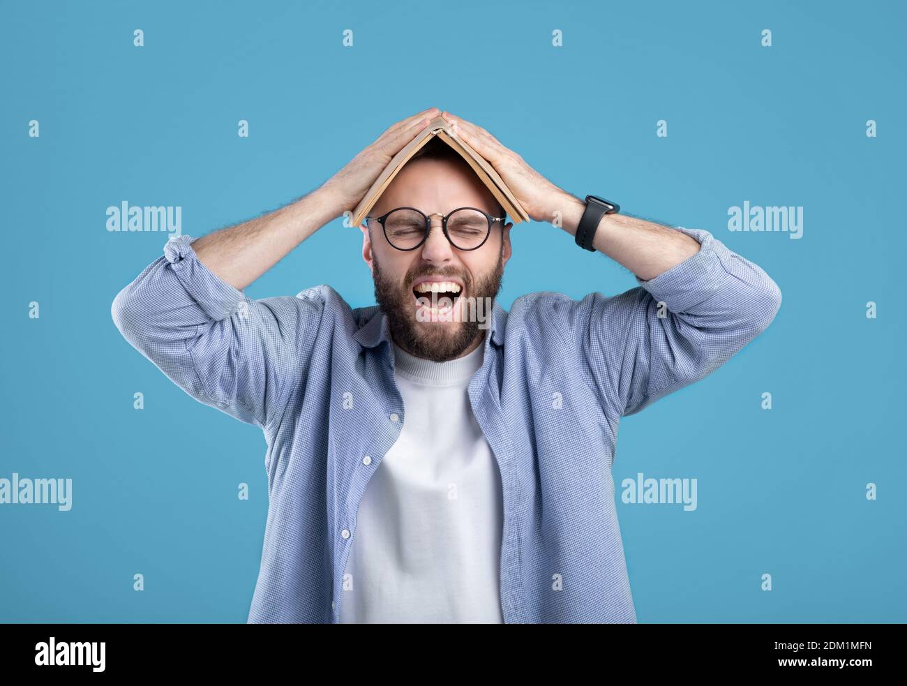 Book head angry hi-res stock photography and images - Alamy