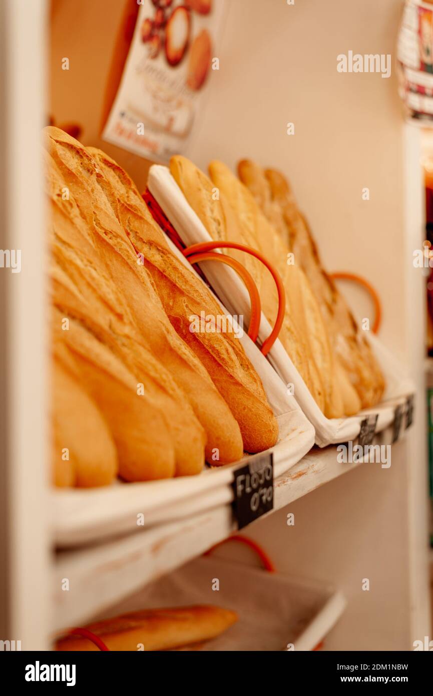 Bread counter display Stock Photo - Alamy