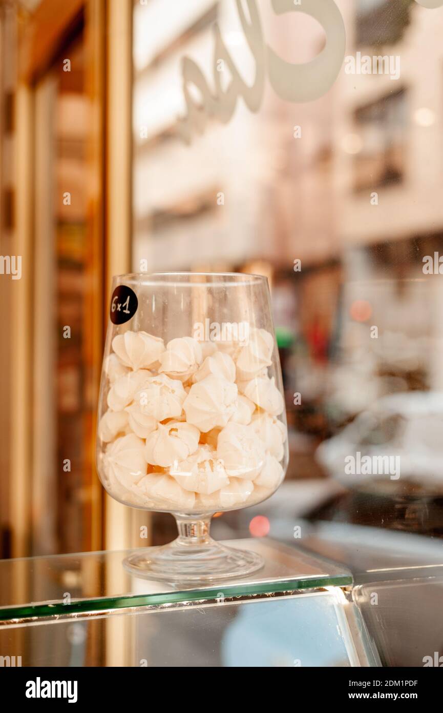 Jar full of pastry cristal counter city background Stock Photo - Alamy