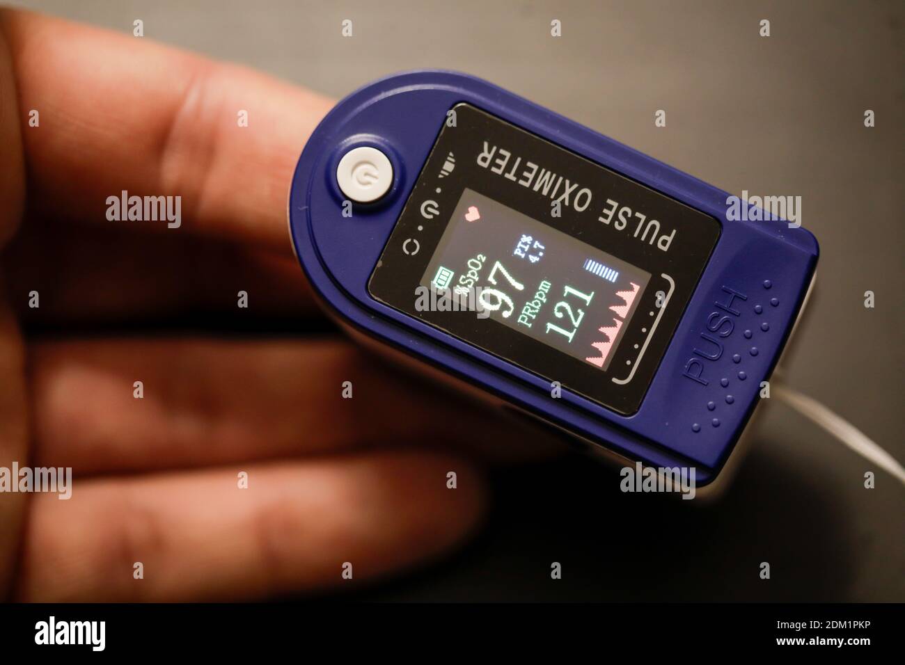 Details with the hand of a man measuring his pulse and blood oxygen ... Details with the hand of a man measuring his pulse and blood oxygen ...