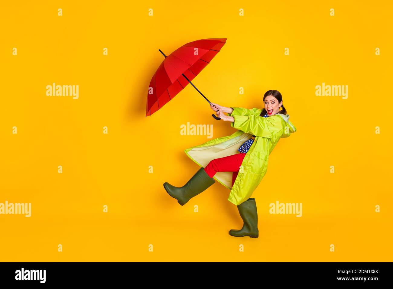 Full size photo of excited crazy girl hold catch air fly wind blow ...