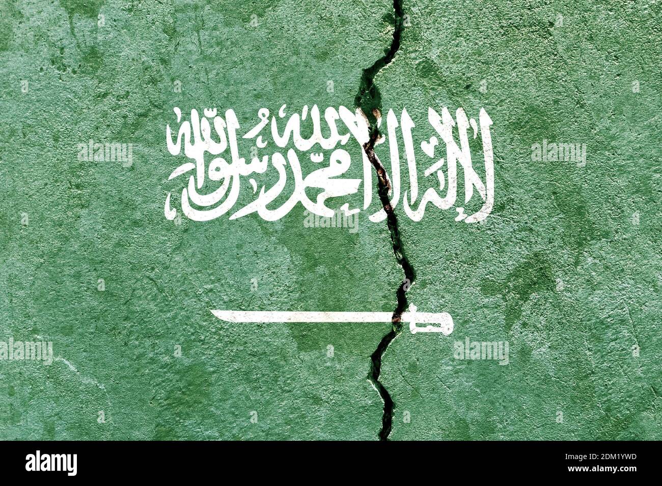 A Saudi Arabian flag on a cracked wall-politics, war, conflict concept ...