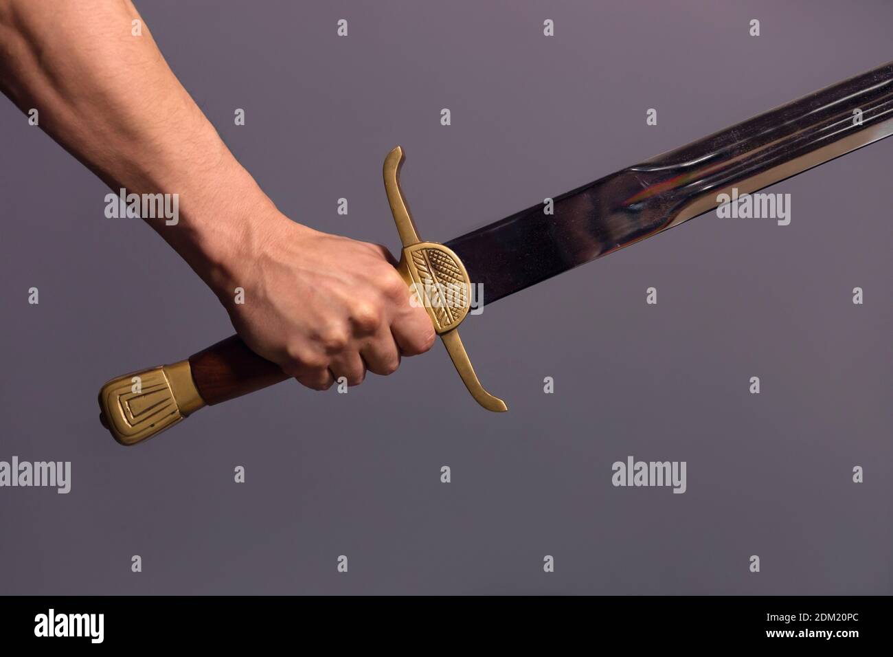 Old man holding sword hi-res stock photography and images - Alamy