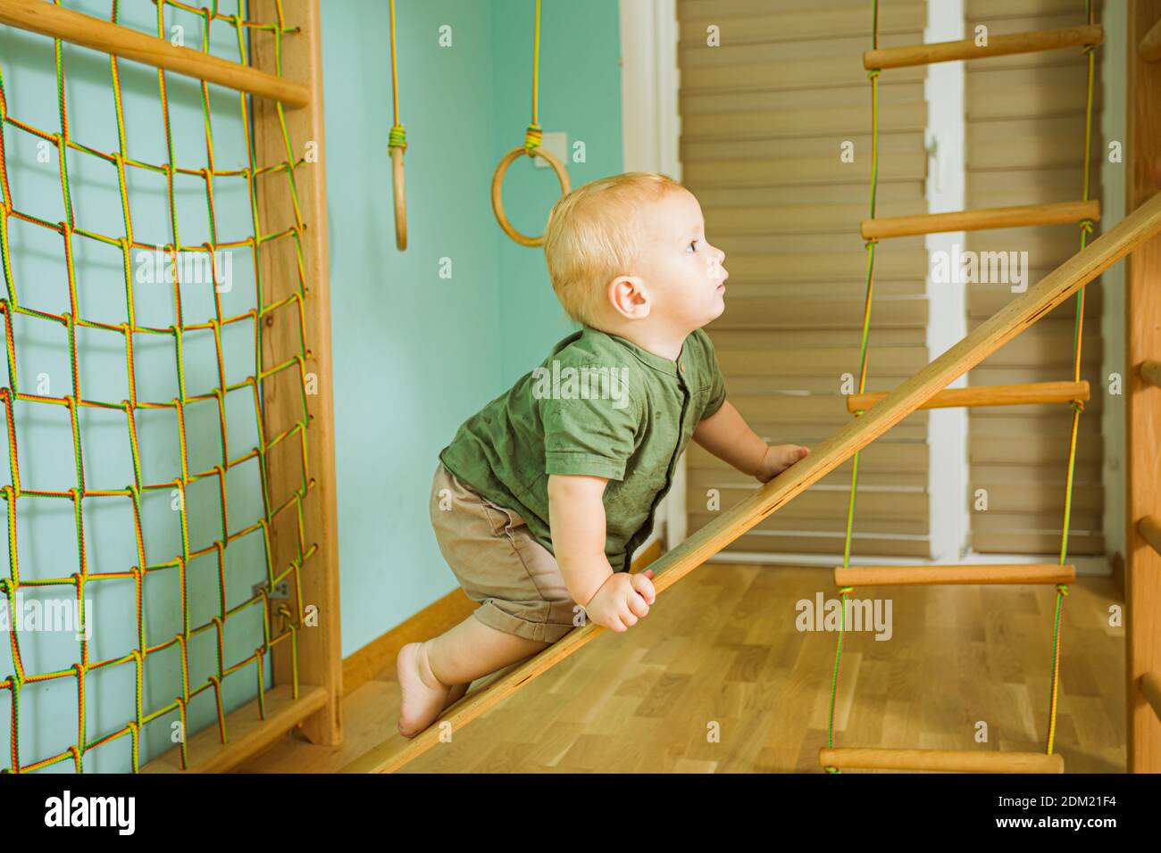 Comprehensive physical development in the gym for a toddler boy Stock ...