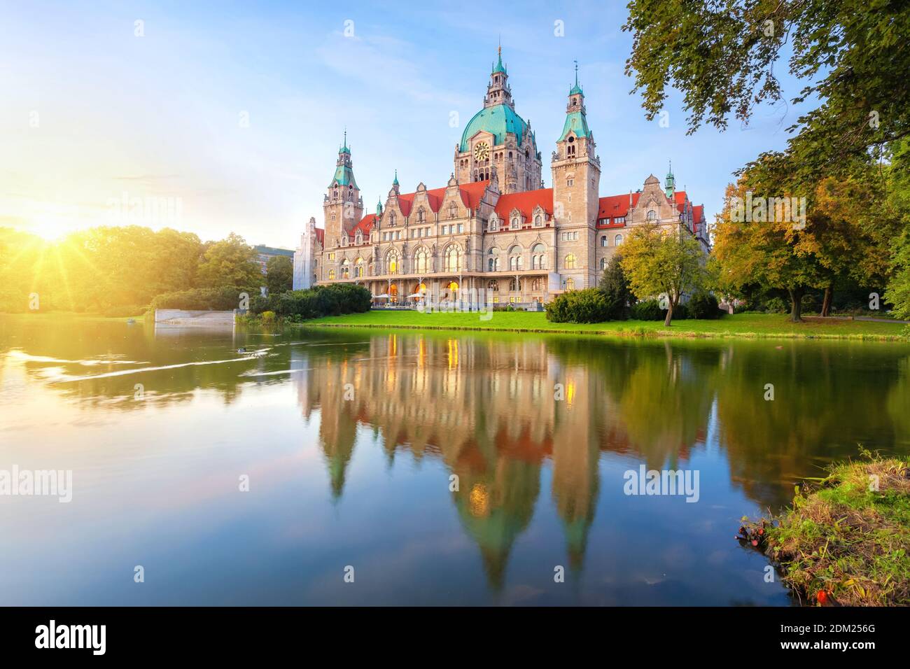 Hanover, Germany. Building of New Town Hall reflecting in water on ...